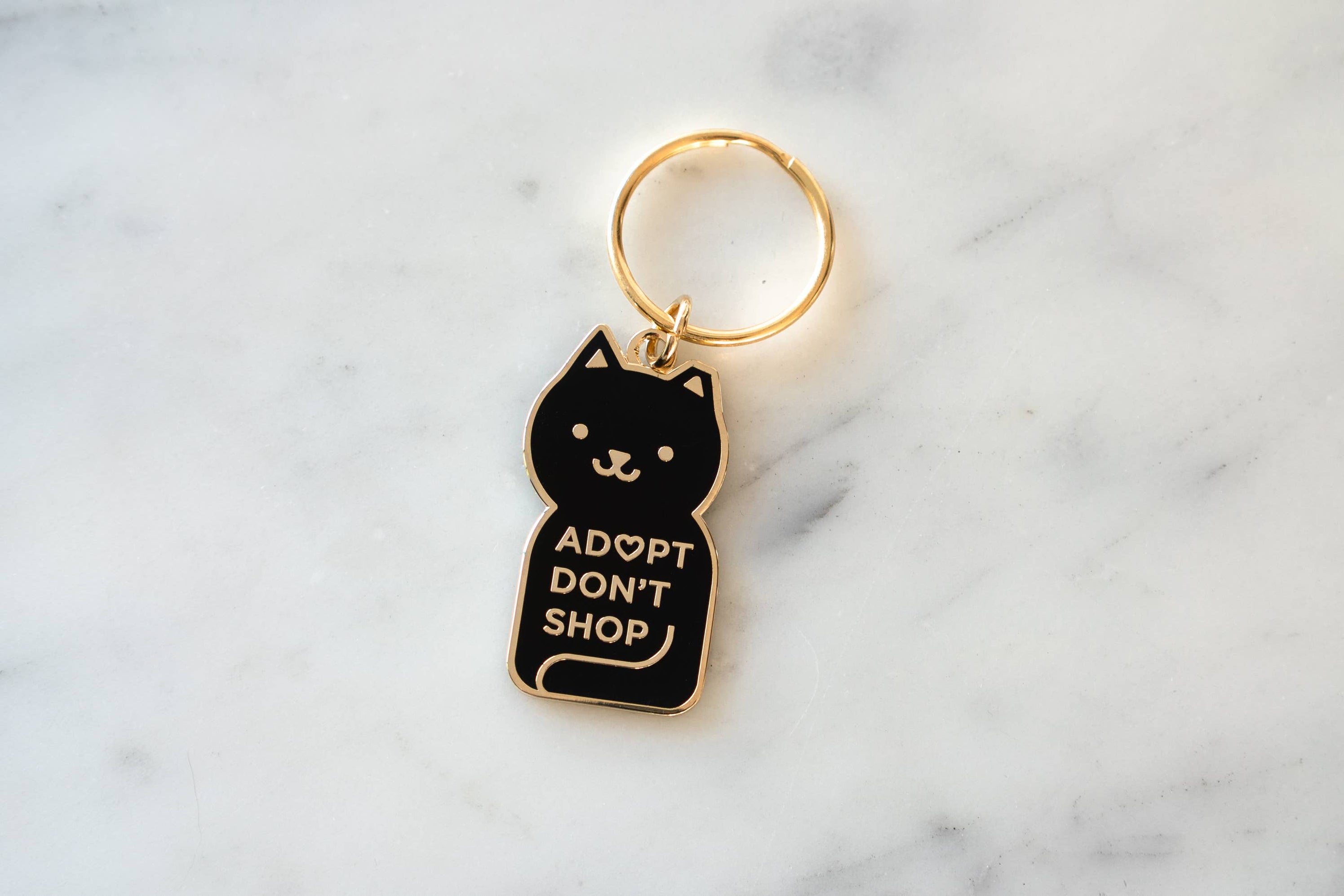 Adopt Don't Shop Keychain — Skulls Unlimited International, Inc.